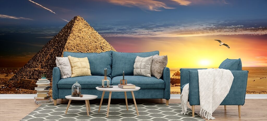 A group of pyramids in a desert with Great Pyramid of Giza in the ...