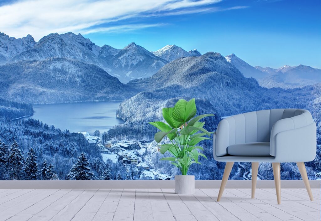 A snowy mountain landscape with a lake and a building - Magicdecor®