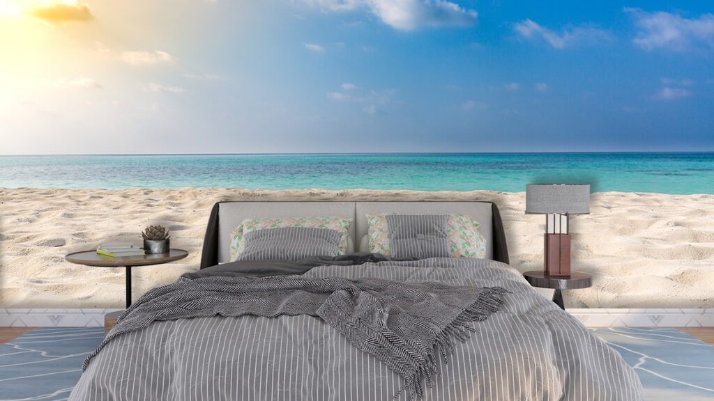 A sandy beach with blue water and blue sky - Magicdecor®