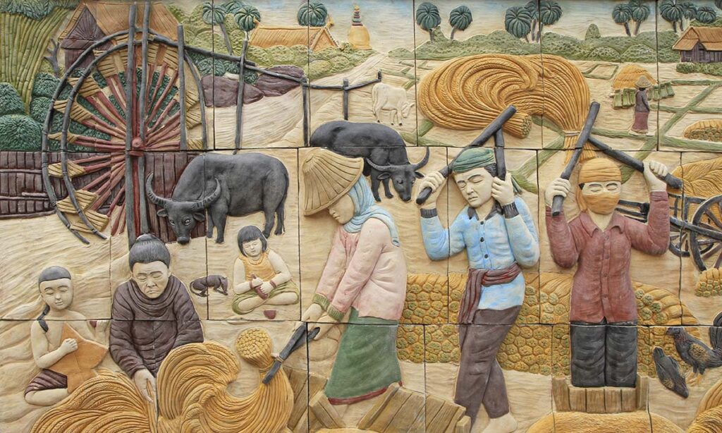 A wall with a mural of people working in the field - Magicdecor®