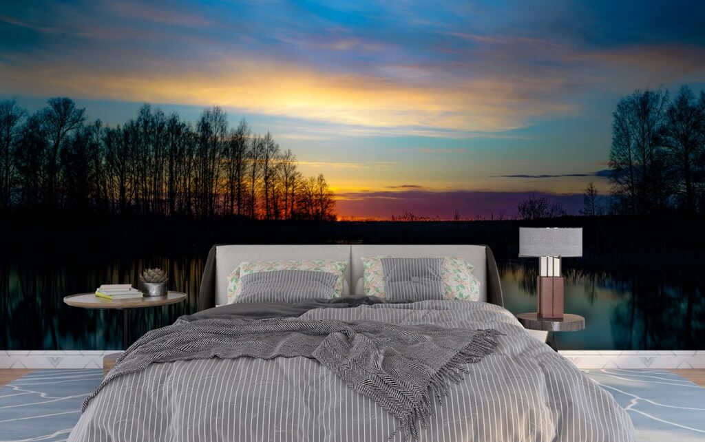 A body of water with trees and a sunset - Magicdecor®